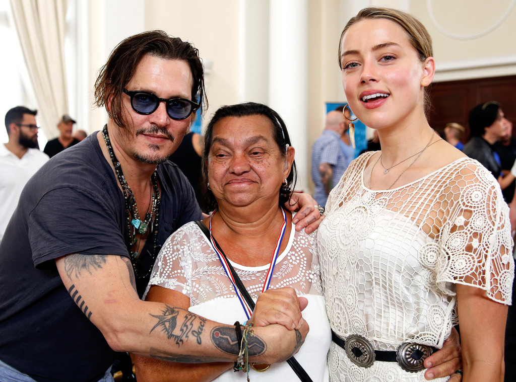 Johnny Depp And Amber Heard Distribute Hearing Aids To Brazilian